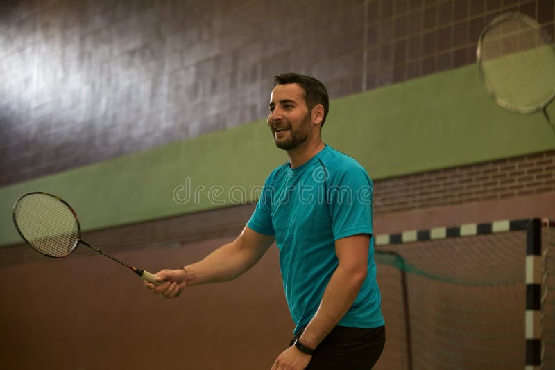Young Man Playing Badminton Stock Image - Image of fitness, sport: 92989989
