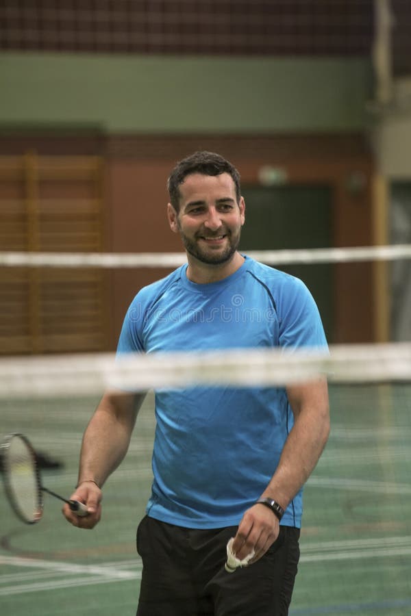 Young Man Playing Badminton Stock Photo - Image of interest, badminton ...