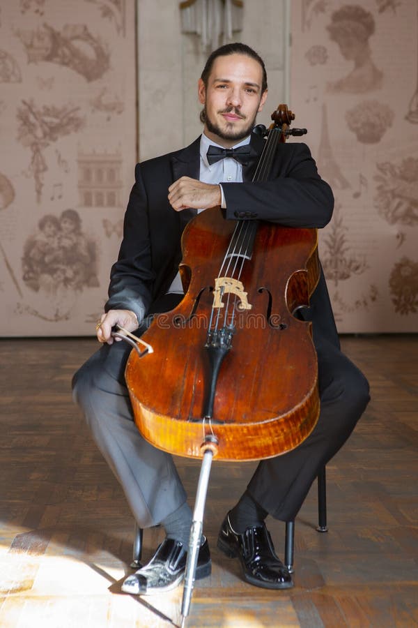 Young Man Playing the Cello. Portrait of the Cellist Stock Image ...