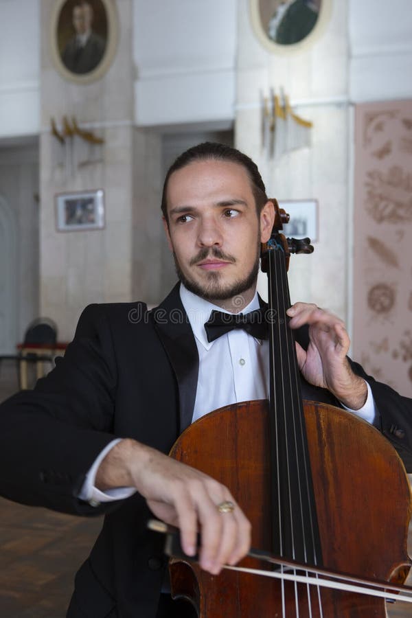 Young Man Playing the Cello. Portrait of the Cellist Stock Image ...