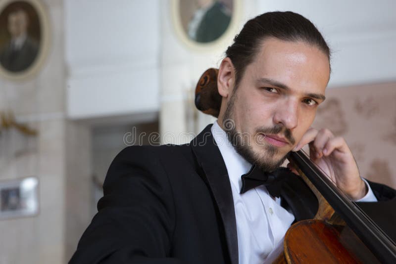 Young Man Playing the Cello. Portrait of the Cellist Stock Image ...