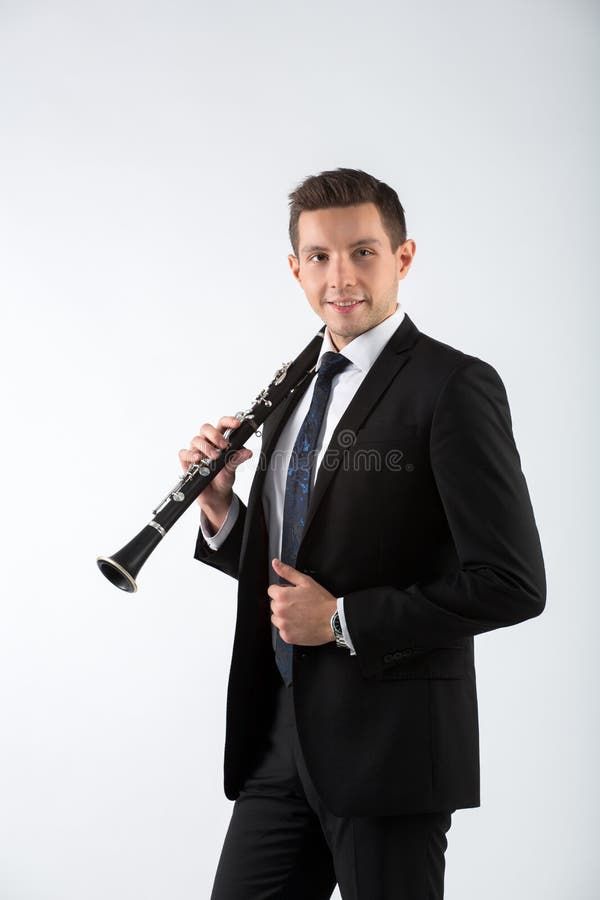Young Man Playing the Clarinet Stock Image - Image of musician ...