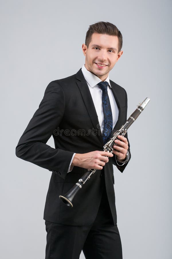 Young Man Playing the Clarinet Stock Photo - Image of classical, play ...