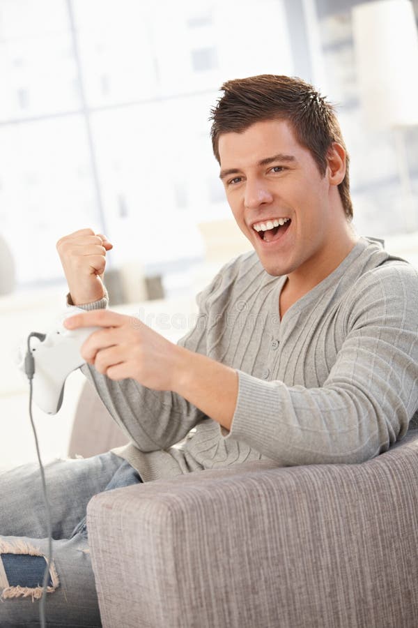 Young Man Playing Computer Game Stock Photo - Image of goodlooking ...
