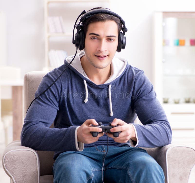 Young Man Playing Computer Games at Home Stock Image - Image of ...