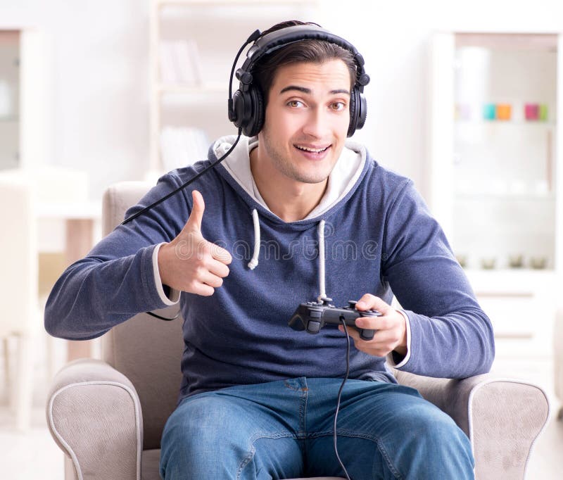 Young Man Playing Computer Games at Home Stock Photo - Image of ...