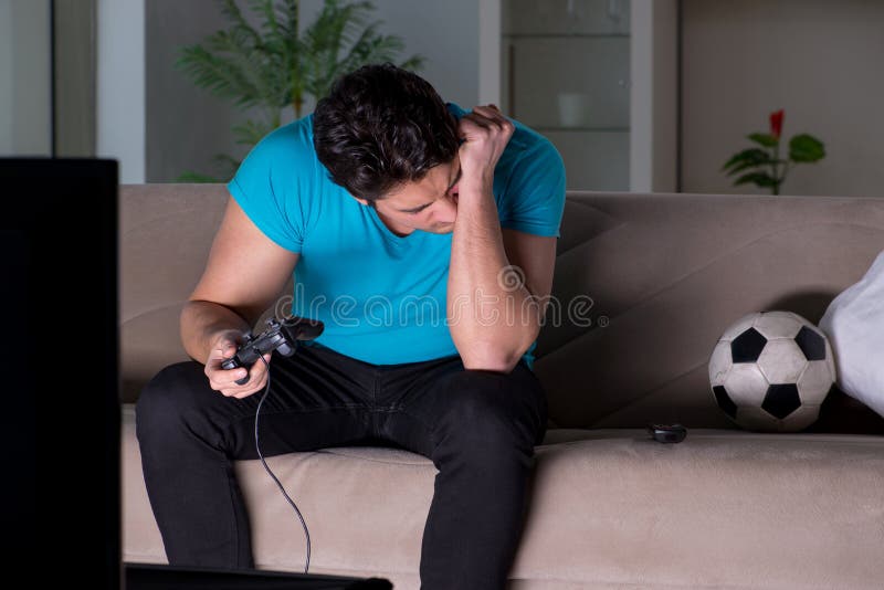 The Young Man Playing Computer Games Late at Night Stock Image - Image ...