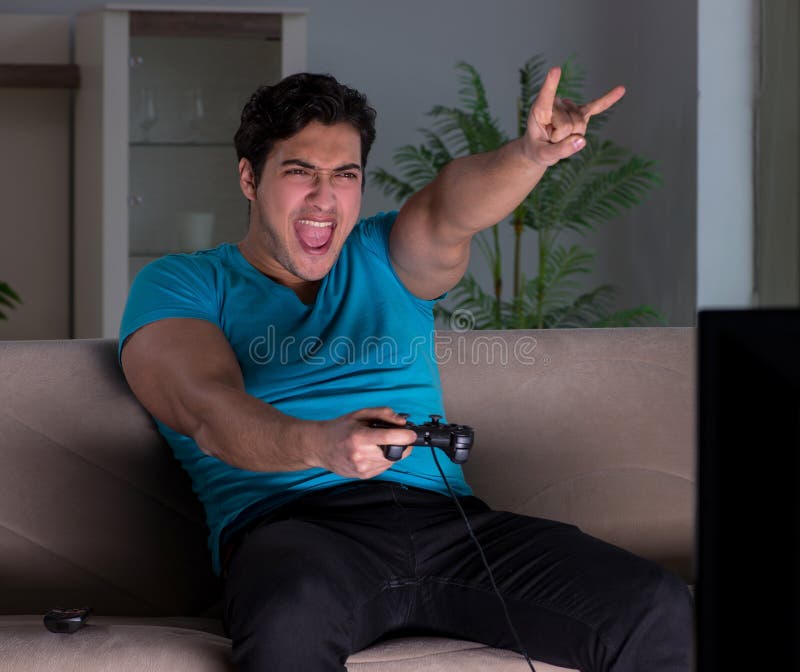 Young Man Playing Computer Games Late at Night Stock Image - Image of ...