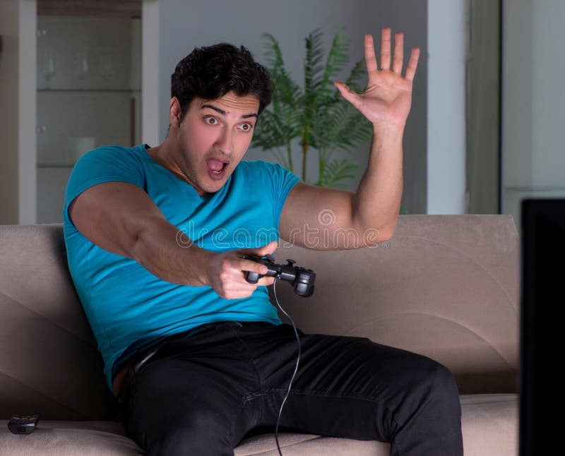 Young Man Playing Computer Games Late at Night Stock Photo - Image of ...