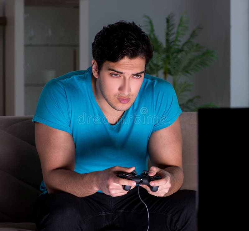Young Man Playing Computer Games Late at Night Stock Image - Image of ...