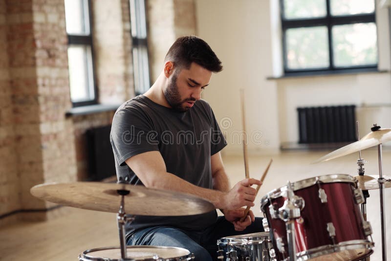Young Man Playing Drums at Studio Stock Image - Image of musician ...