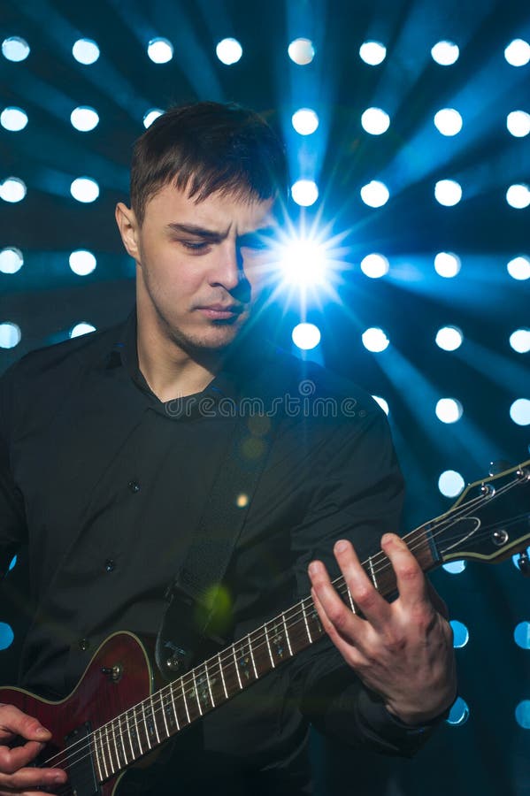 Young Man Playing on Electric Guitar Stock Photo - Image of jamming ...