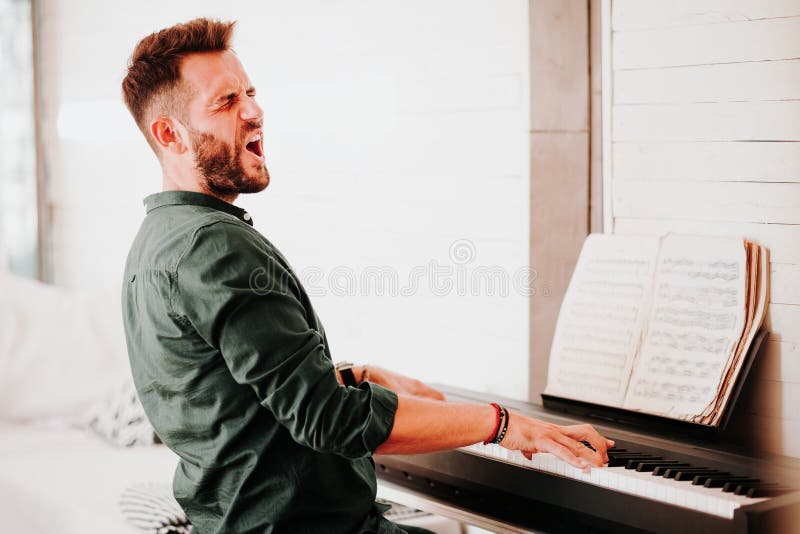 Young Man Playing Electric Piano at Home Stock Photo - Image of ...
