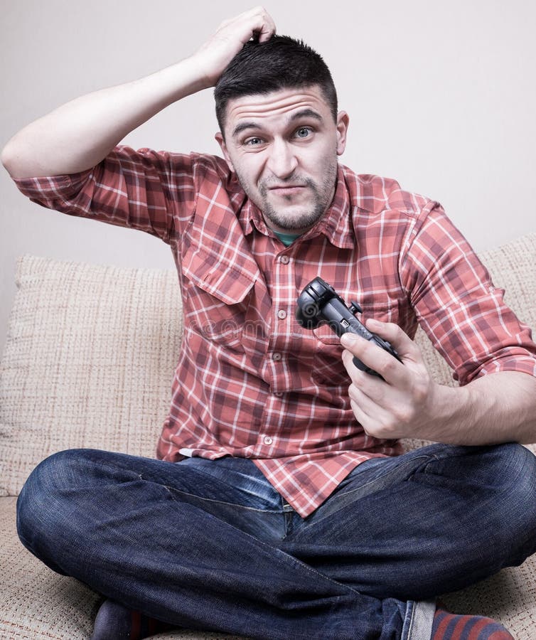 Young man playing stock image. Image of home, face, happy - 71664255