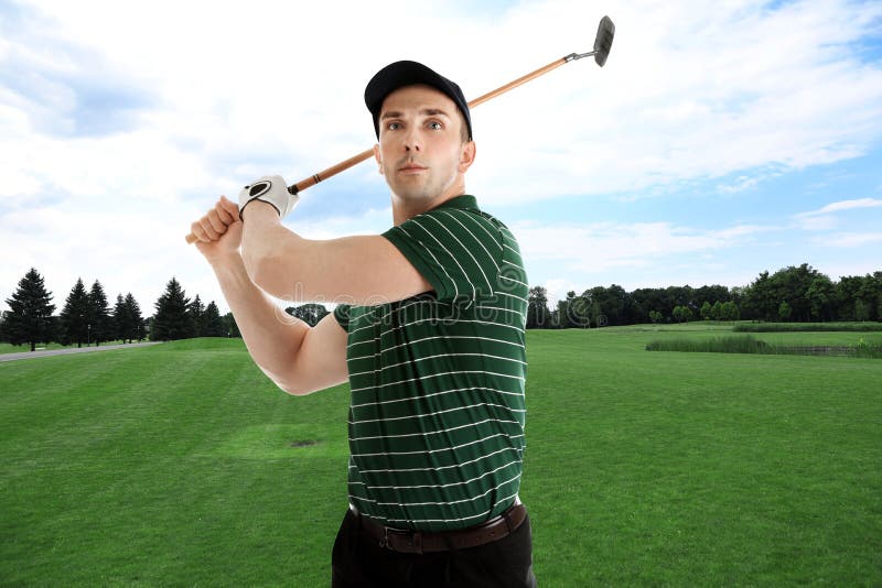 Young Man Playing Golf on Course with Grass Stock Photo - Image of ...