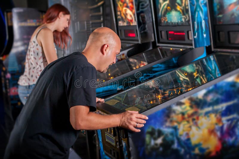 Row of Lights at the Pinball Arcade Editorial Photo - Image of playing ...