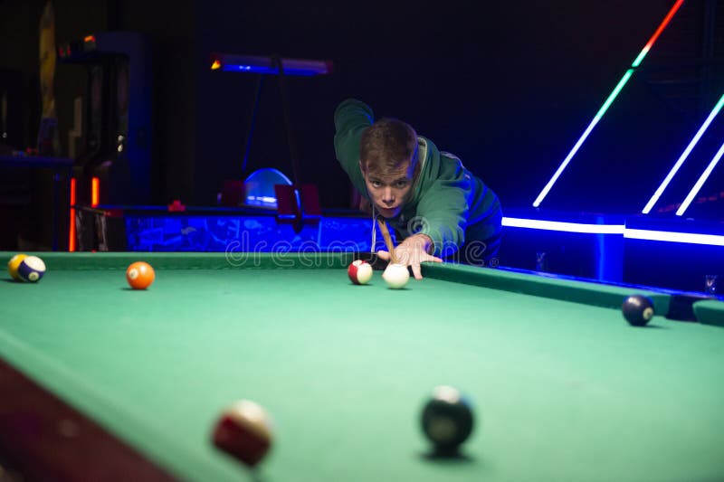 Young Man Playing Pool in Pub Stock Image - Image of adult, sphere ...