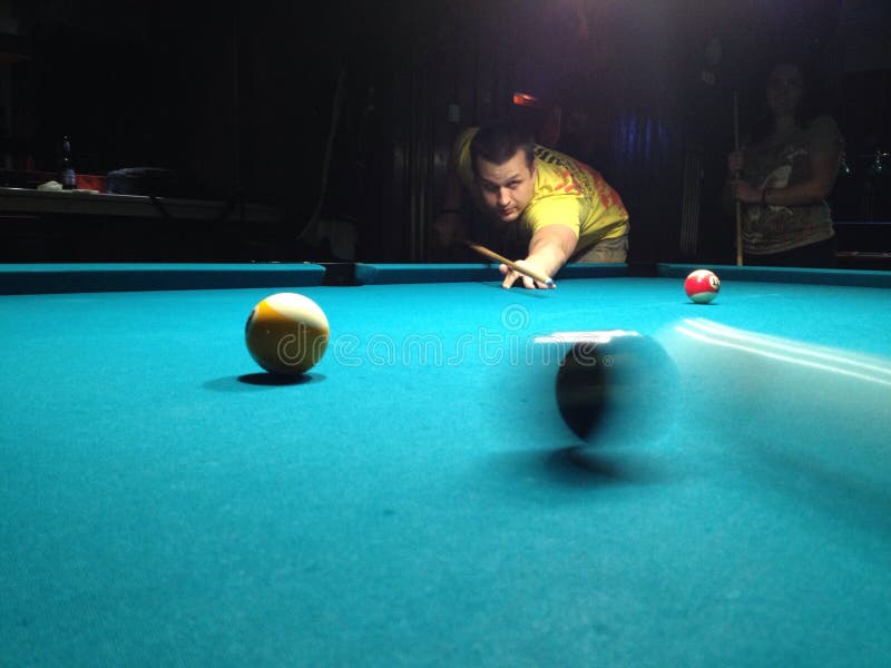 Young man playing pool editorial photo. Image of play - 44236551