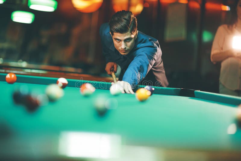 Young people playing pool stock photo. Image of beautiful - 53279672