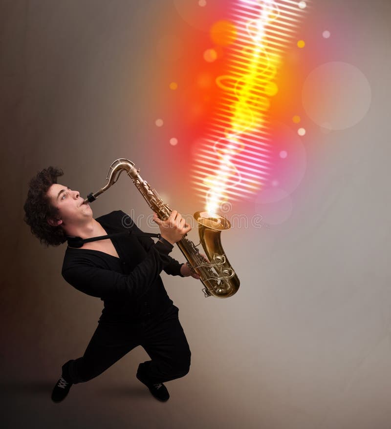 Young Man Playing on Saxophone with Colorful Sound Waves Stock Image ...