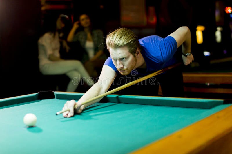Young man playing snooker stock image. Image of adult - 64182401