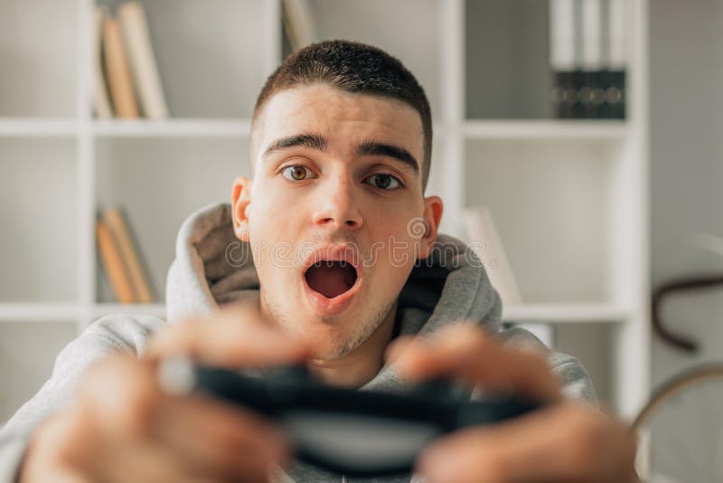 Young Man Playing with Video Game Stock Photo - Image of leisure, game ...