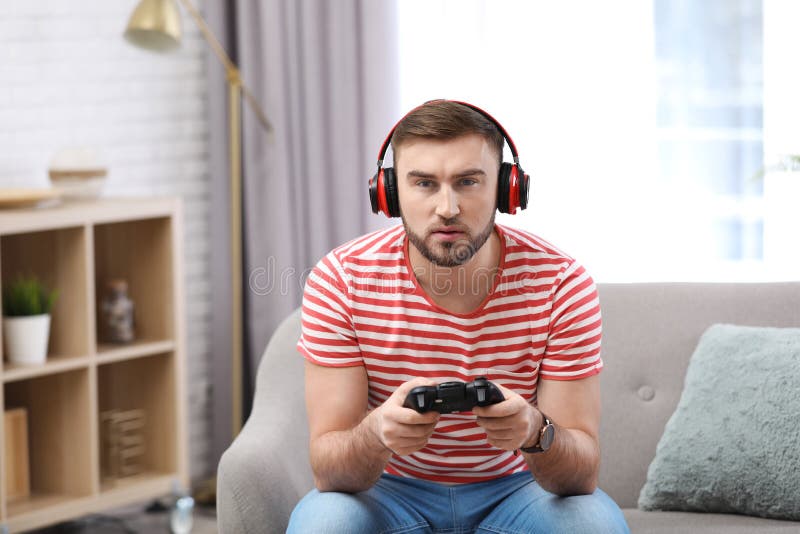 Young Man Playing Video Game Stock Photo - Image of addiction, game ...