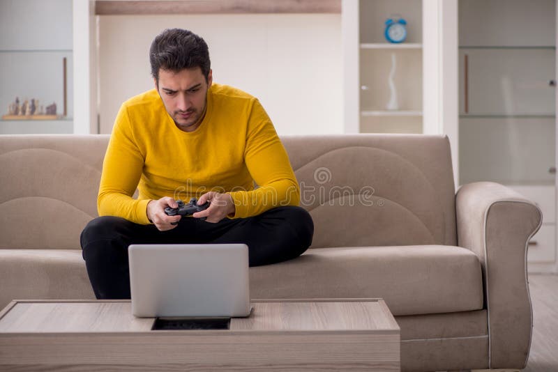 Young Man Playing Video Games at Home Stock Image - Image of syndrome ...