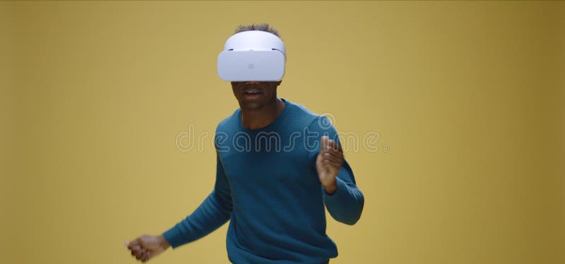 Young man playing VR game stock image. Image of modern - 166222233