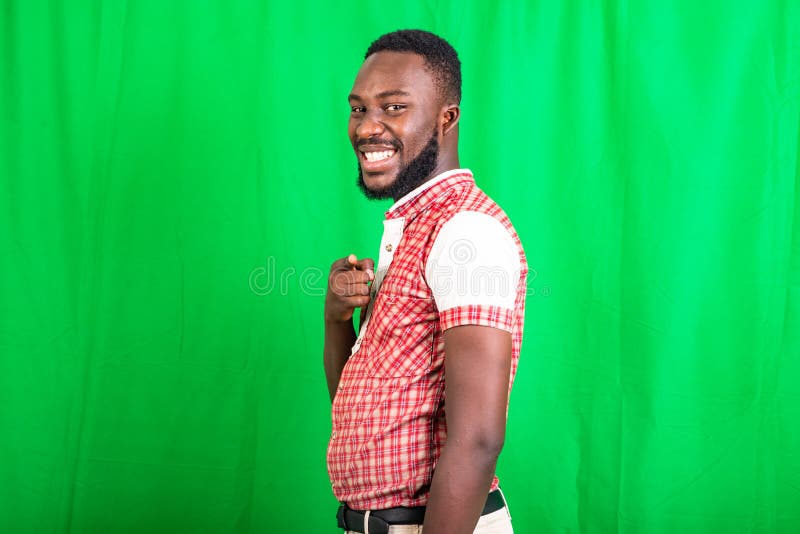 Young Man Pointing Finger Forward Smiling Stock Image - Image of ...