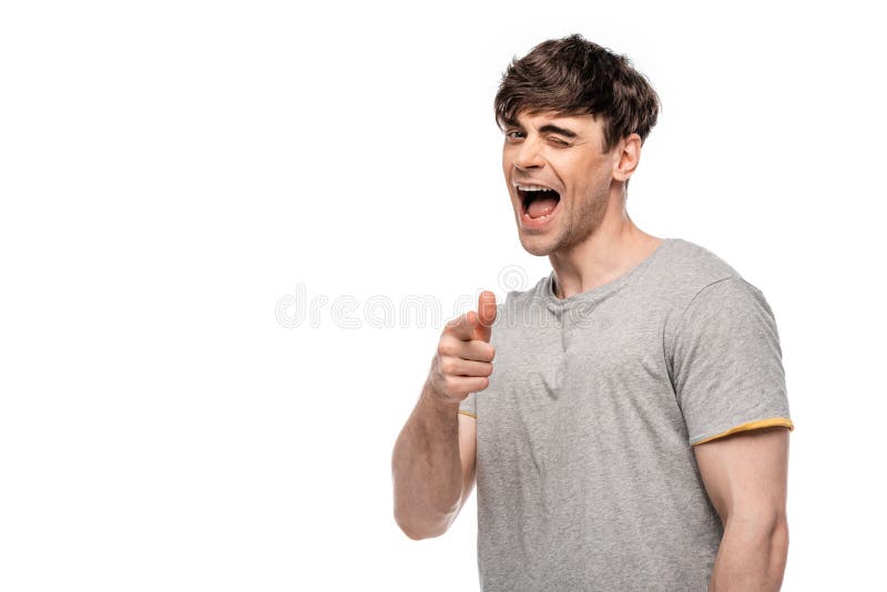 Young Man Pointing with Finger and Winking at Camera Isolated on White ...