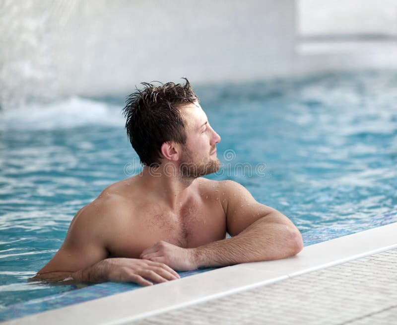 Young man in the pool stock photo. Image of blue, relax - 47797214