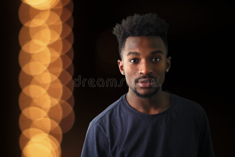 Young Man Portrait Dark Shadow Orange Lights Background Stock Photo ...