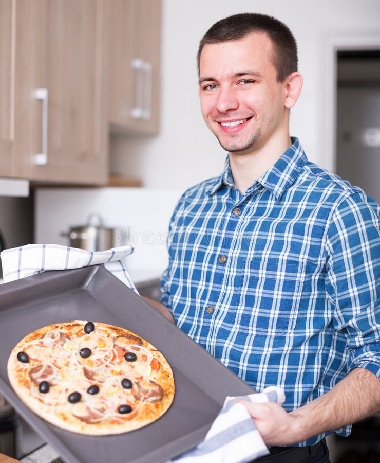 Young Man Posing with Delicious Pizza Stock Photo - Image of domestic ...