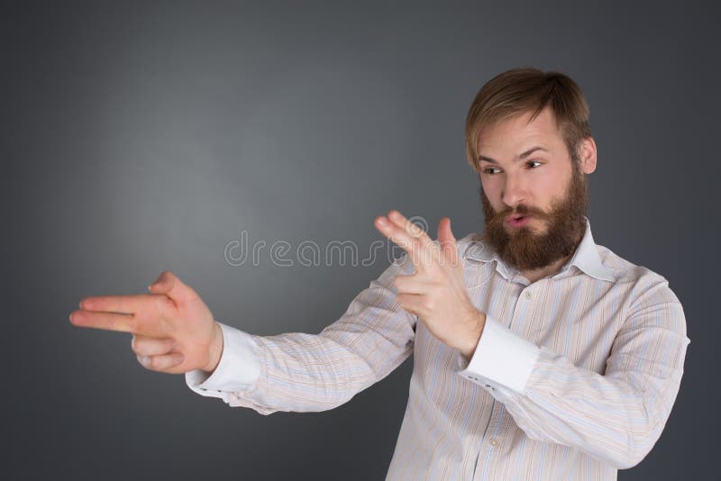 Young Man Posing with Finger-guns Stock Photo - Image of handsome ...