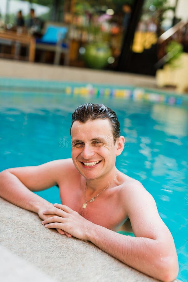 Wet Man Posing in the Swimming Pool Stock Photo - Image of bristle ...