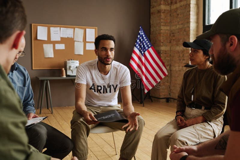 Young Man with Post Traumatic Syndrome Explaining Something To Other ...