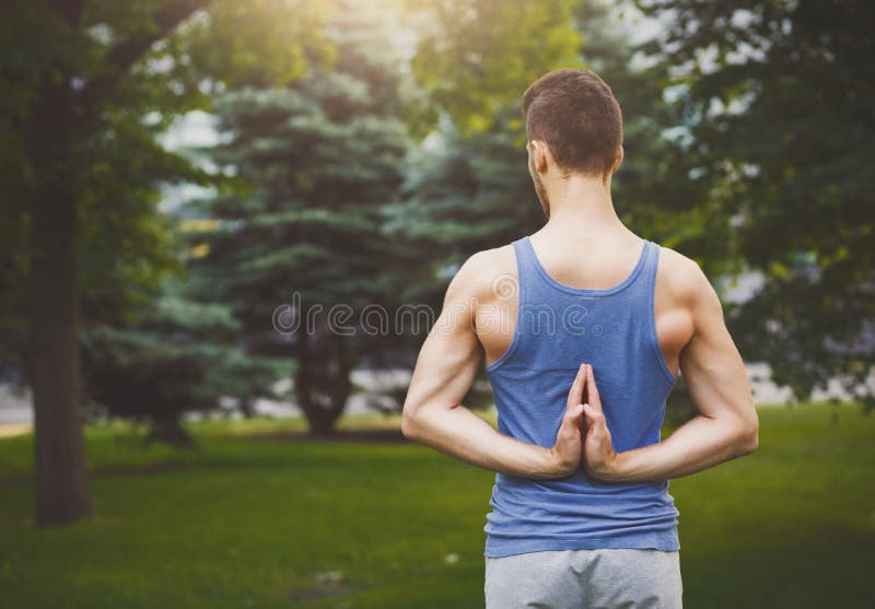 Young Man Practicing Yoga, Reverse Prayer Pose Stock Image - Image of ...