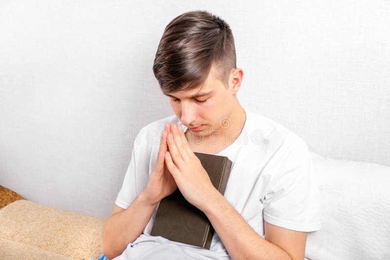 Young Man praying stock image. Image of praying, caucasian - 188774313
