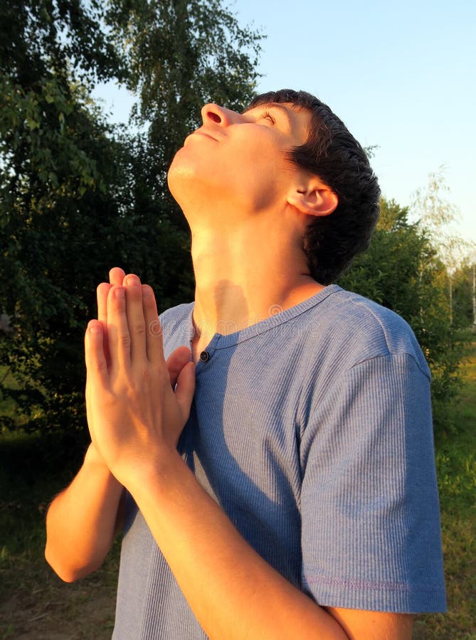 Young Man Praying stock photo. Image of nature, pray - 65312704