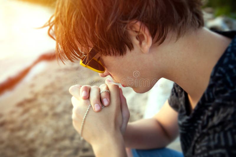 Young Man praying stock image. Image of pray, meditation - 230659939