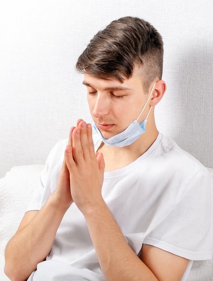 Young Man praying stock image. Image of faith, grace - 201775251
