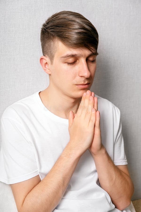 Young Man praying stock image. Image of pray, gesture - 188774207
