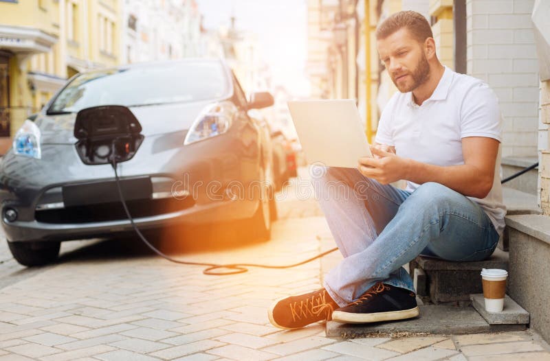 Young Man Preparing for Business Meeting while Waiting Stock Image ...