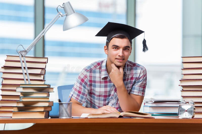 The Young Man Preparing for Graduation Exams in College Stock Photo ...