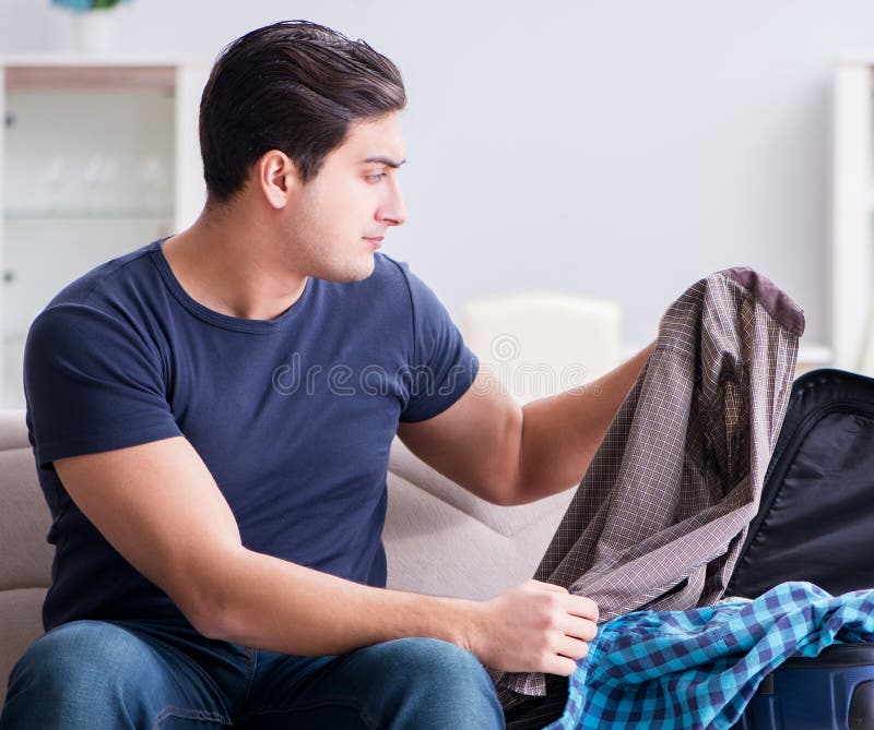 Young Man Preparing Packing for Summer Vacation Stock Photo - Image of ...