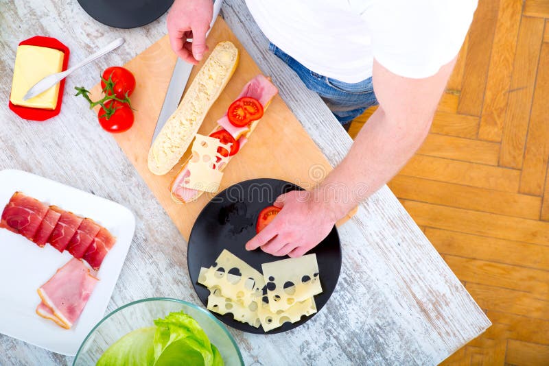 Young Man Preparing a Sandwich Stock Image - Image of culinary ...