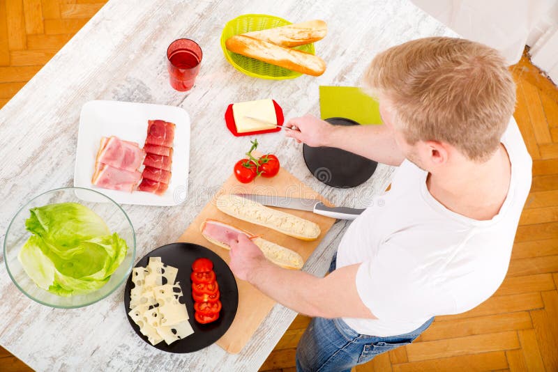 Young Man Preparing a Sandwich Stock Image - Image of hands, freshness ...