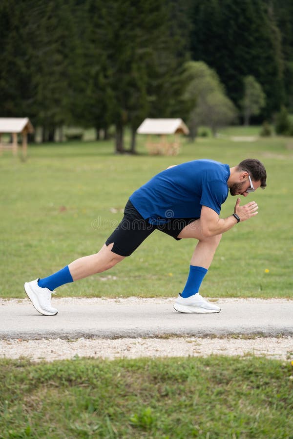 Young Man Preparing for a Sprint Stock Image - Image of path, shoes ...