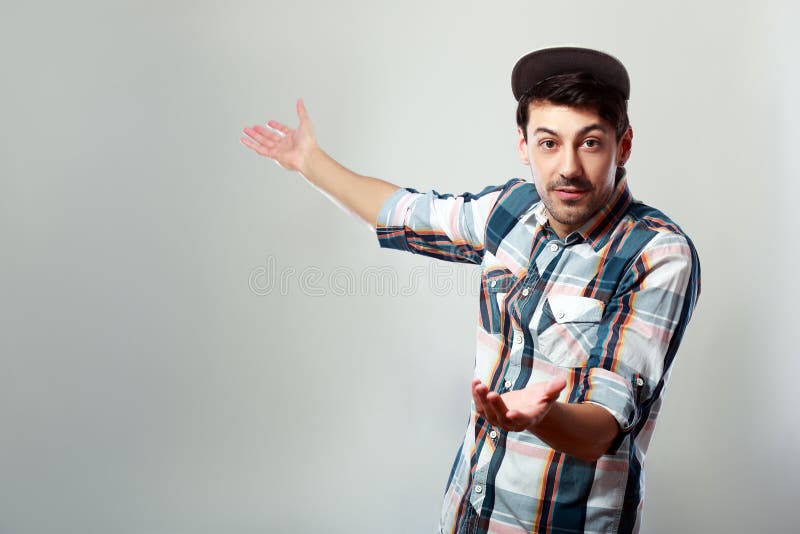 Young man presenting stock image. Image of casual, blue - 86671443
